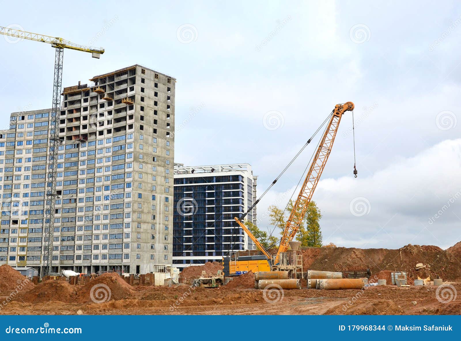 Crawler Crane at the Construction Site. Digging a Pit for the Building ...