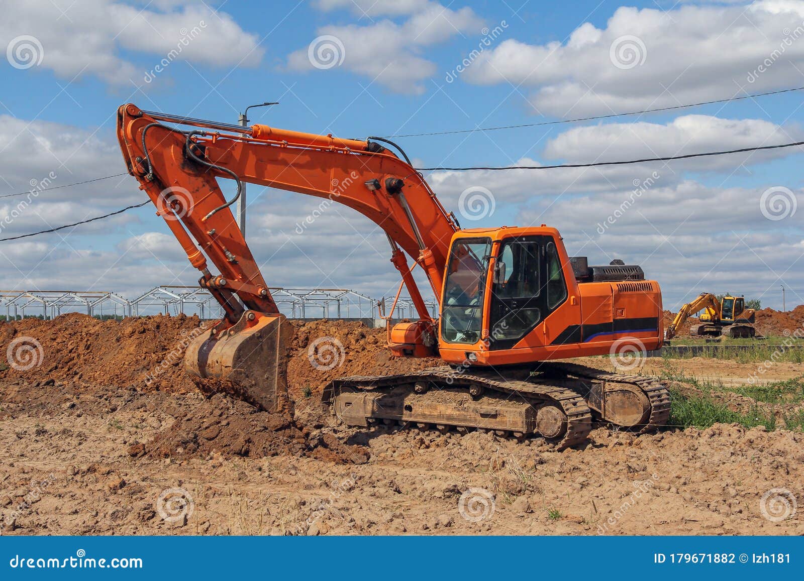 Crawler Excavator at a Construction Site. Special Machinery for ...