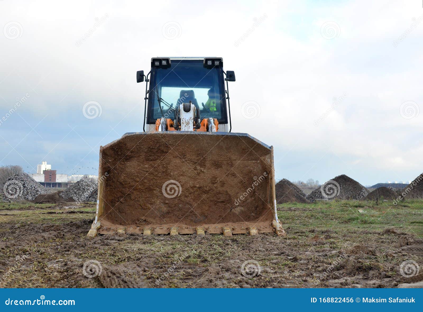 Crawler Loader at Construction Site. Land Clearing, Grading, Pool ...