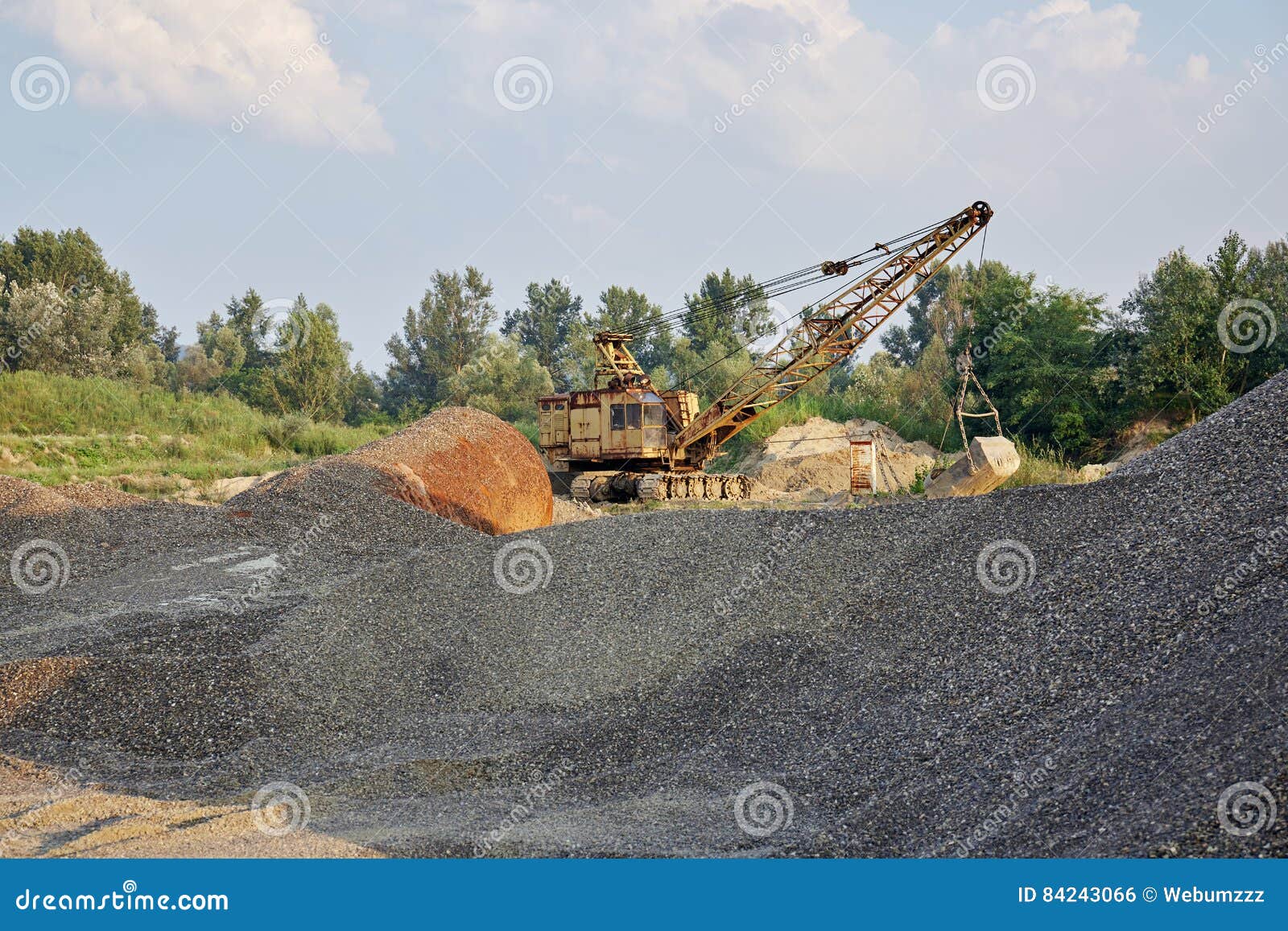 Crawler-mounted Excavator in Gravel Canyon Stock Photo - Image of lift ...