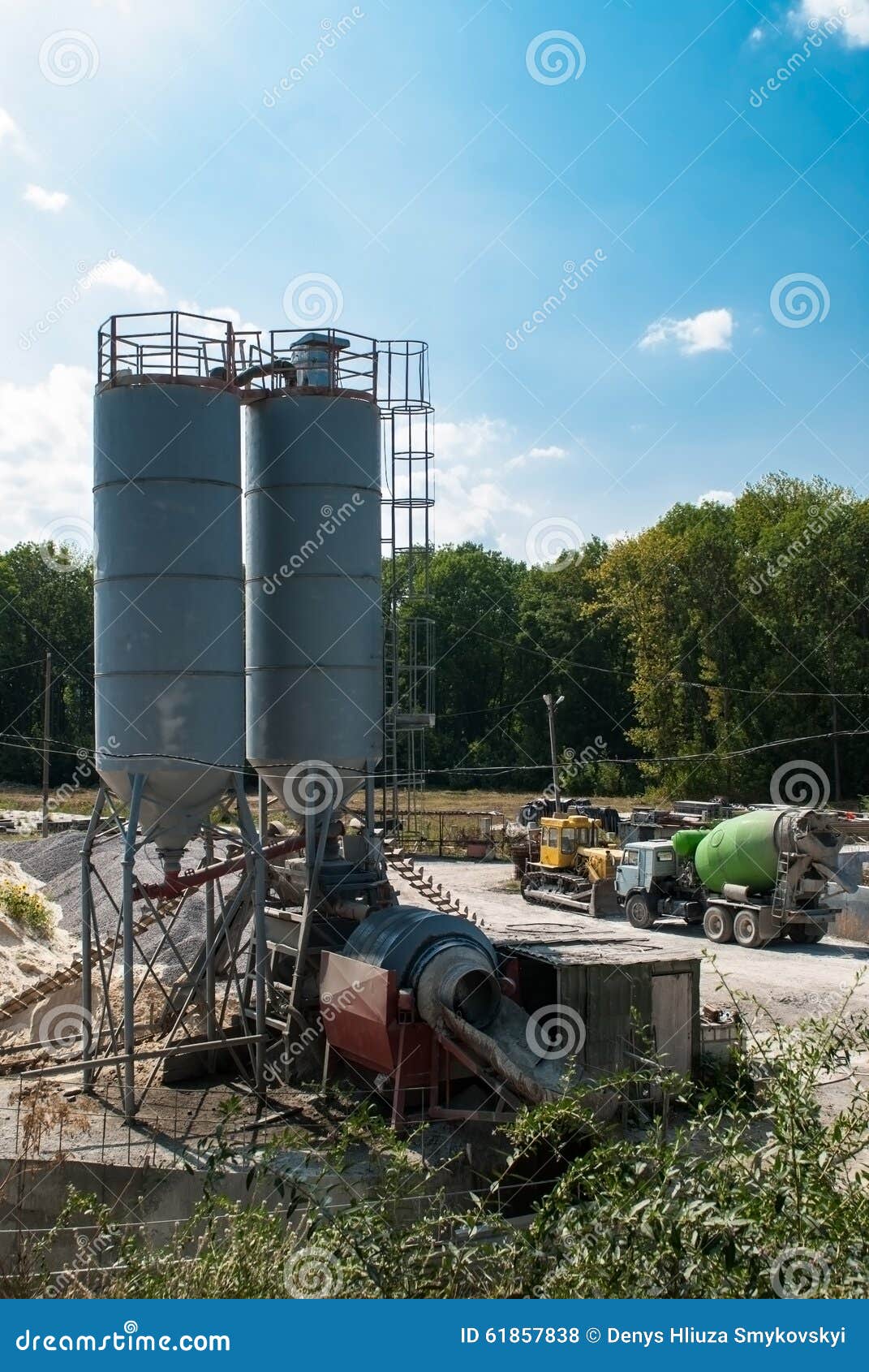 Crawler Tractor and a Concrete Mixer Stock Photo - Image of foundation ...