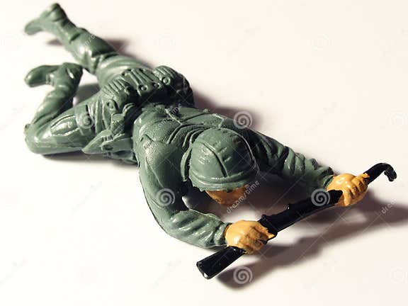 Crawling toy soldier stock photo. Image of figure, belly - 85168
