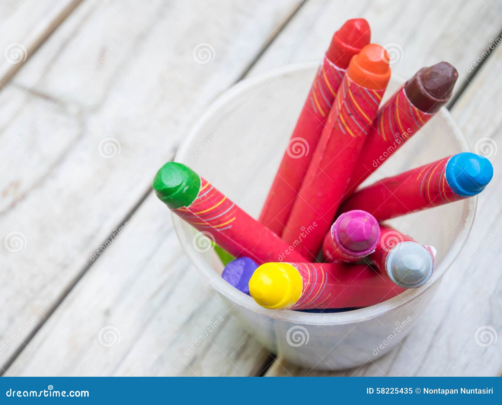 Crayons in plastic glass stock image. Image of kids, classroom - 58225435