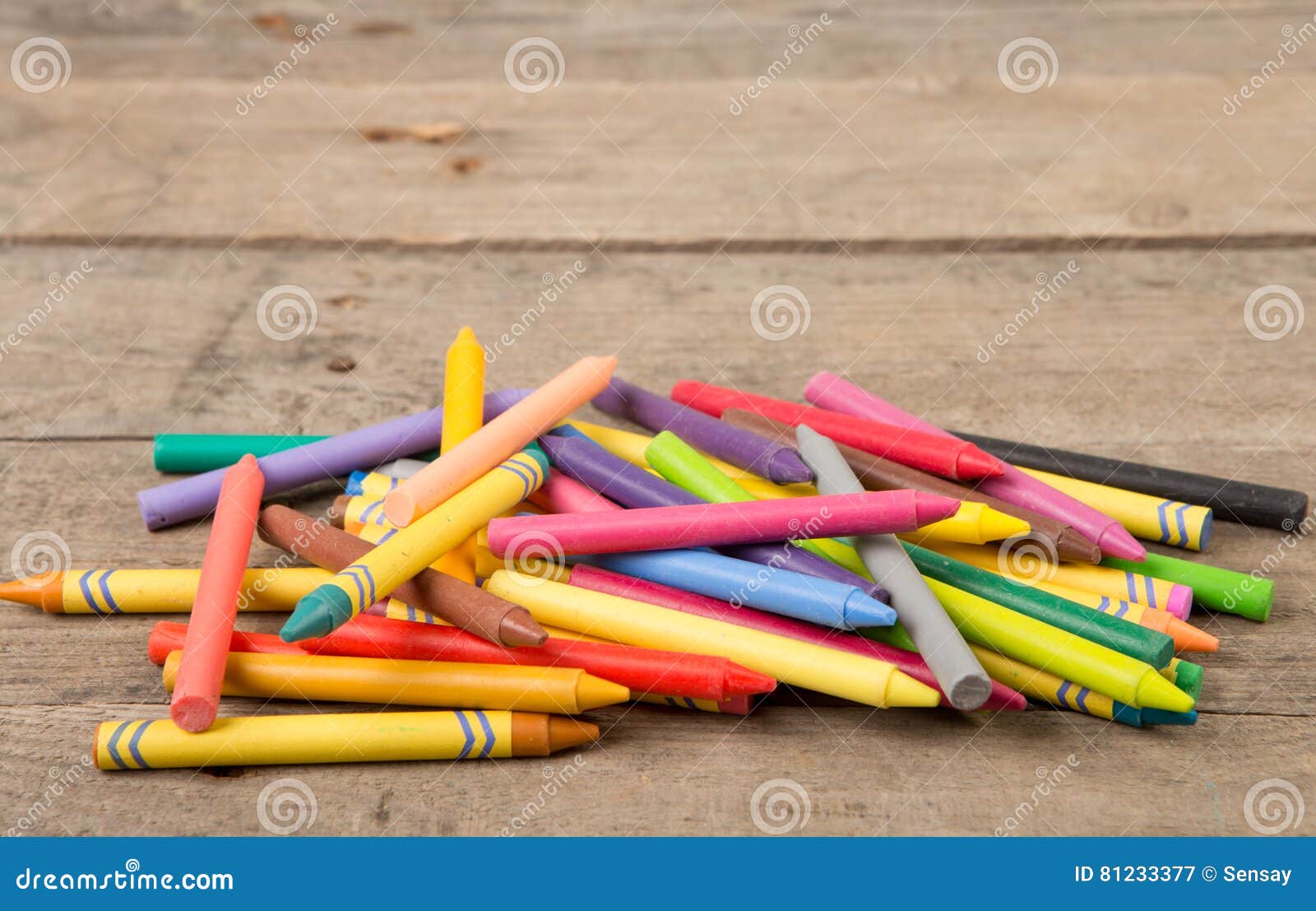 Crayons on the wooden desk stock image. Image of crayons - 81233377