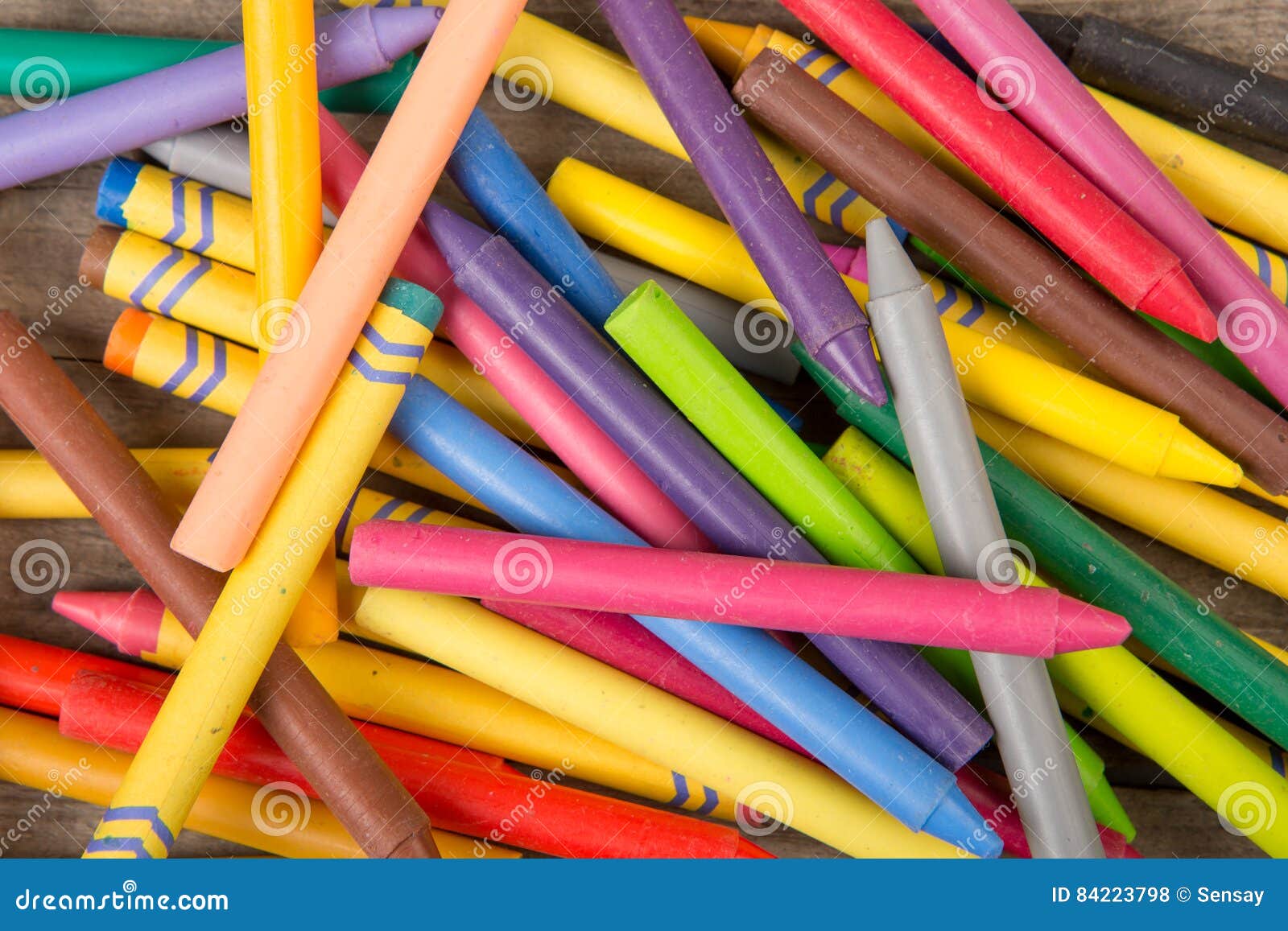 Crayons on the wooden desk stock photo. Image of crayons - 84223798