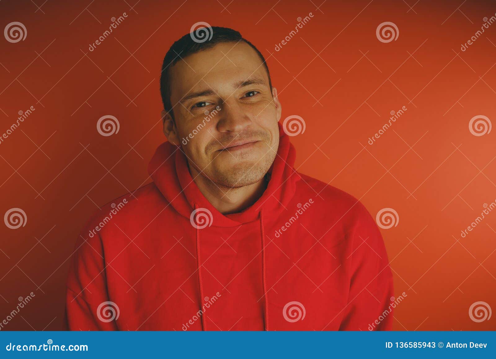 Crazy and Charismatic Guy Posing on an Orange Background. a Man in a ...