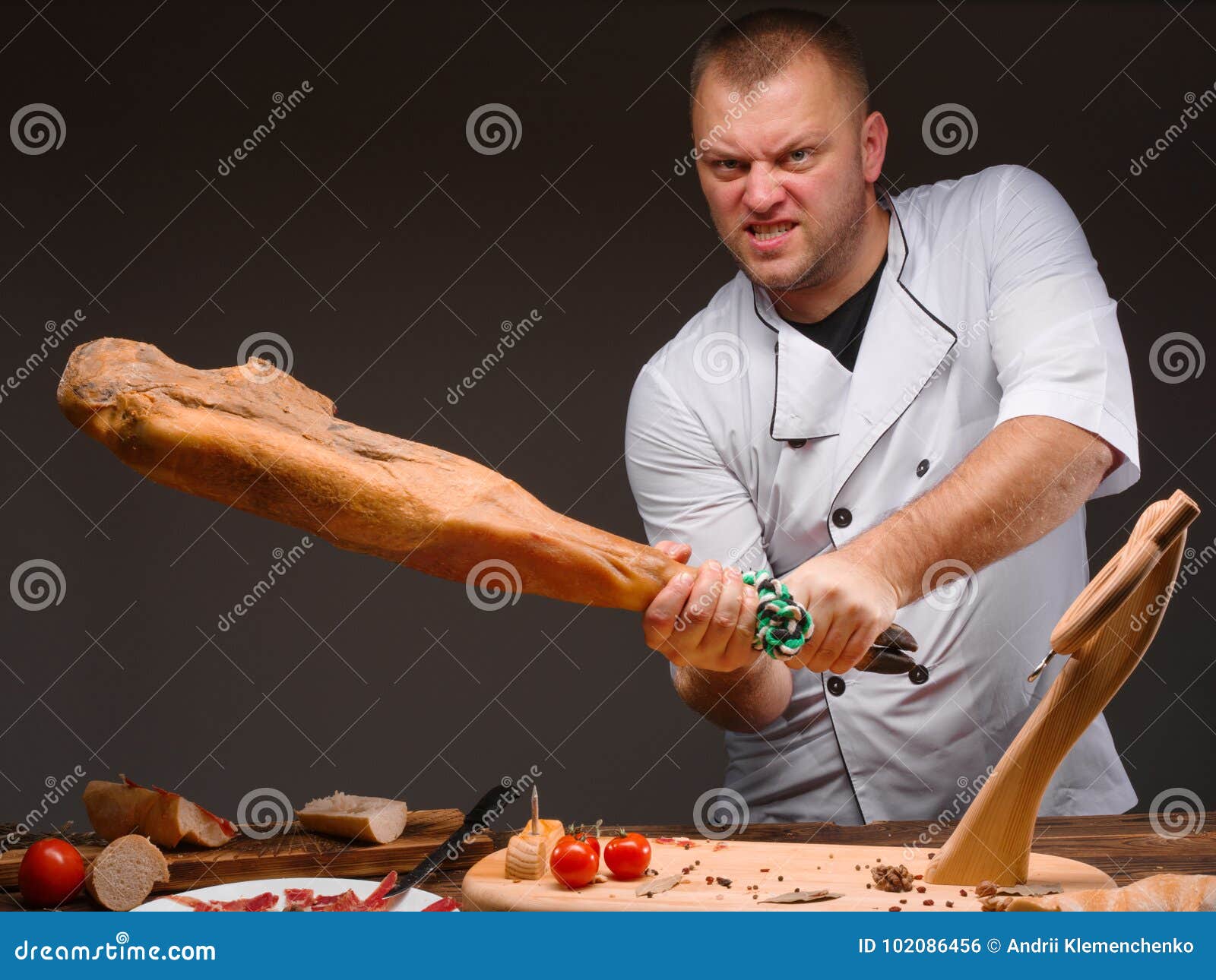 Crazy Cook in the Kitchen with Pork Leg in Hands. Close Up Horizontal ...