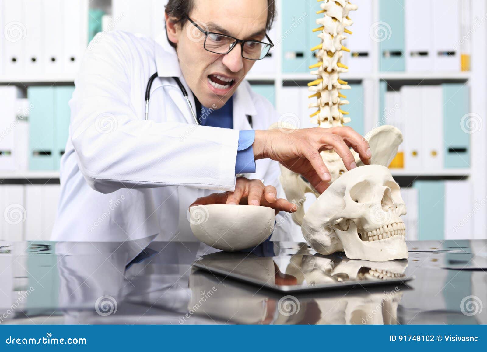 Crazy Doctor with Skull in Office Stock Photo - Image of concept ...
