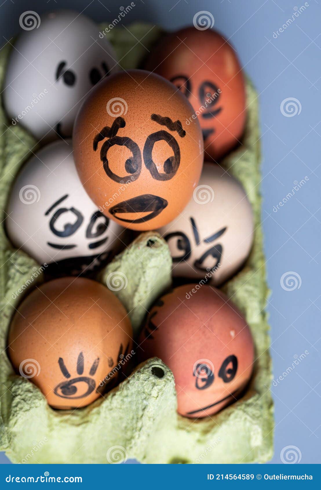 Crazy Eggs Terrified. Scared Faces Peering Out of the Egg Tray Stock ...