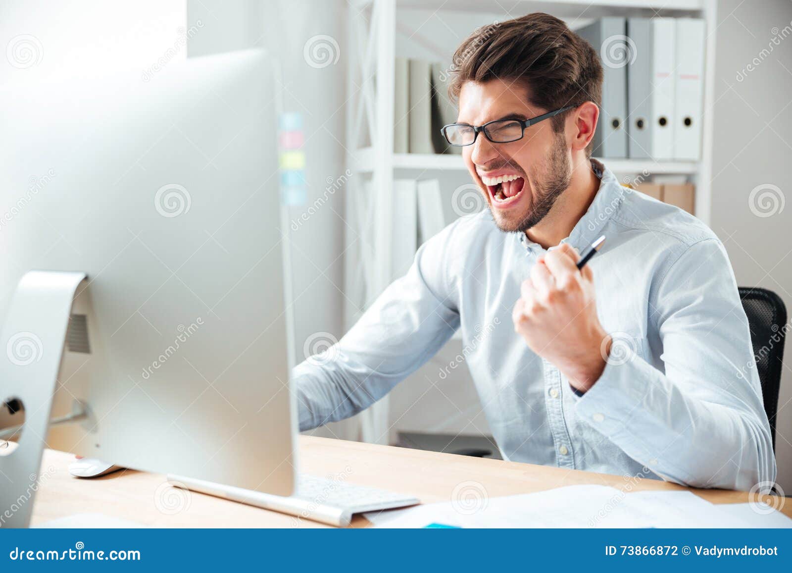 Crazy Furious Young Businessman Working and Screaming Stock Photo ...