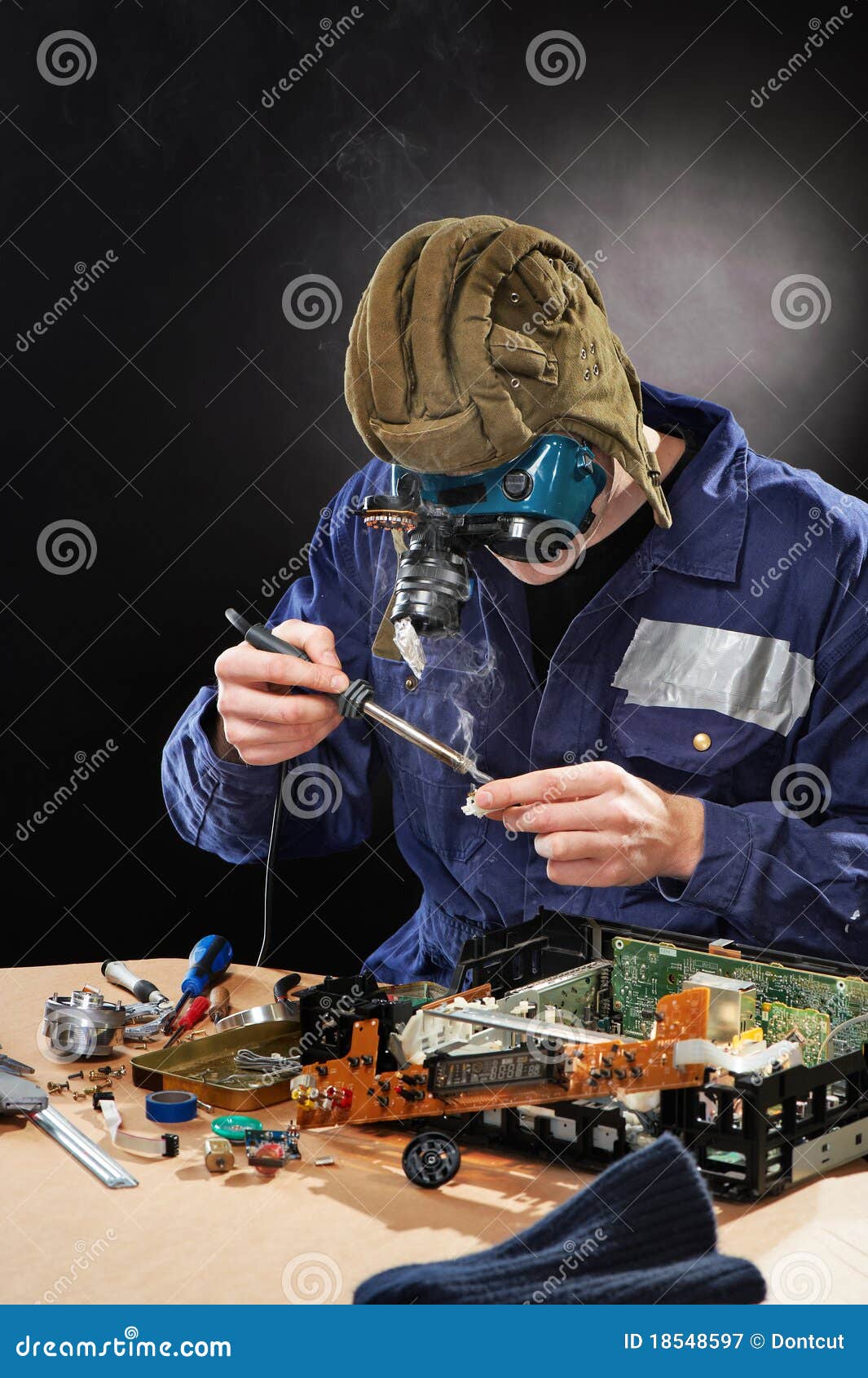 Crazy Genious Witth Soldering Iron Stock Image - Image of magnifying ...