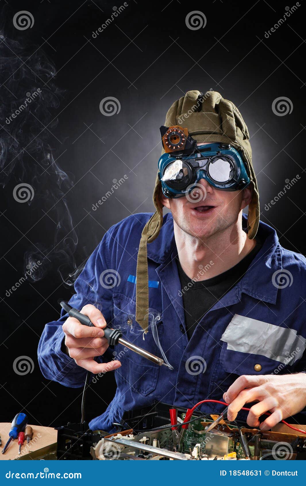 Crazy Genious Witth Soldering Iron Stock Image - Image of component ...