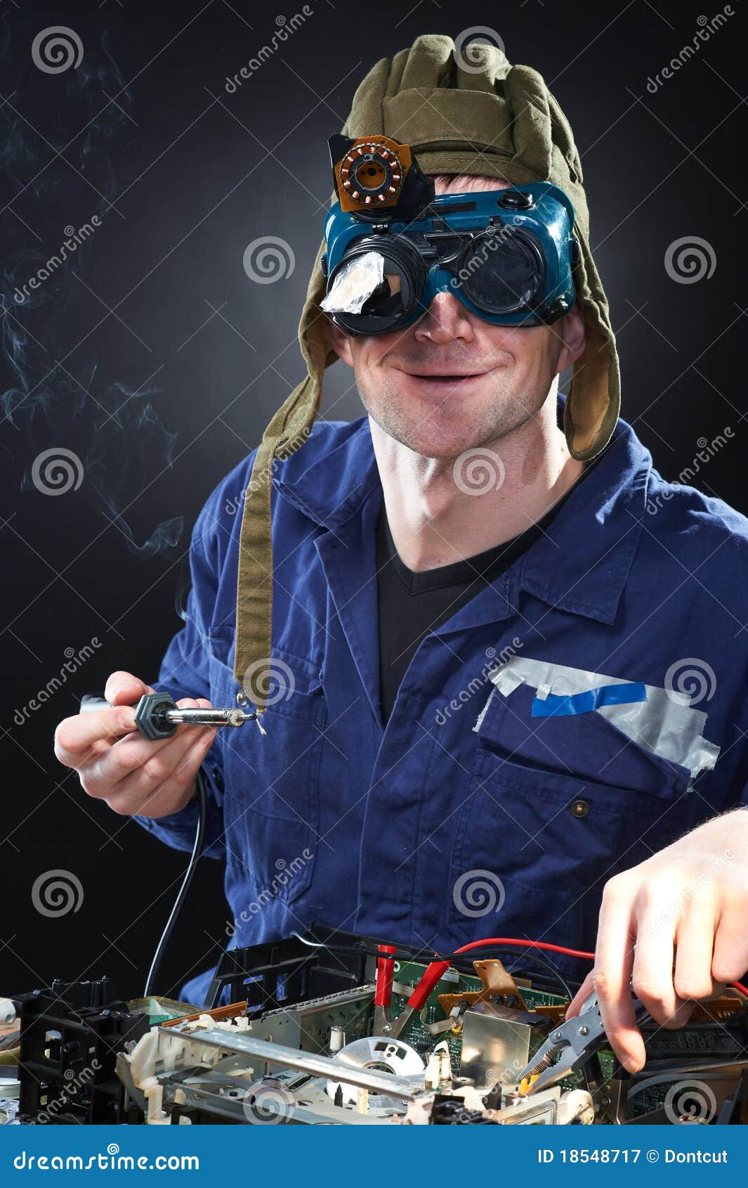 Crazy Genius Witth Soldering Iron Stock Image - Image of component ...