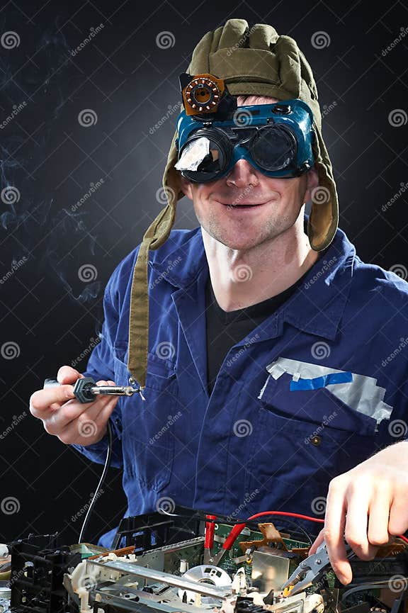 Crazy Genius Witth Soldering Iron Stock Image - Image of component ...