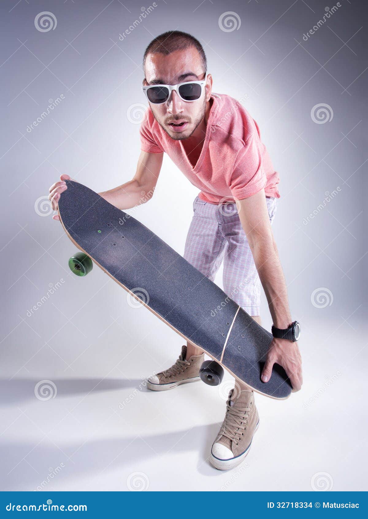 Crazy Guy with a Skateboard Making Funny Faces Stock Photo - Image of ...