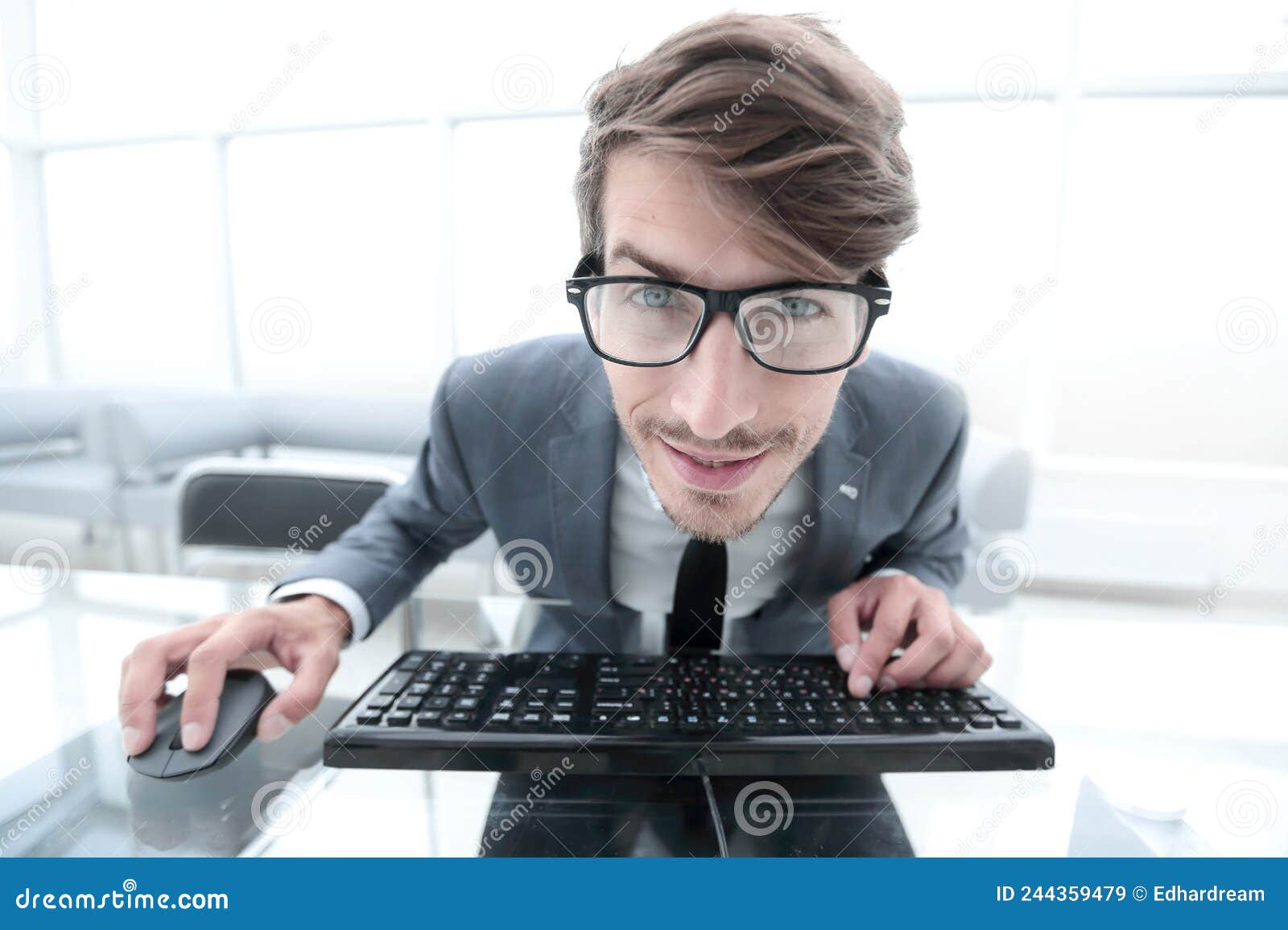 Crazy Looking Man Typing on the Keyboard Stock Image - Image of smile ...