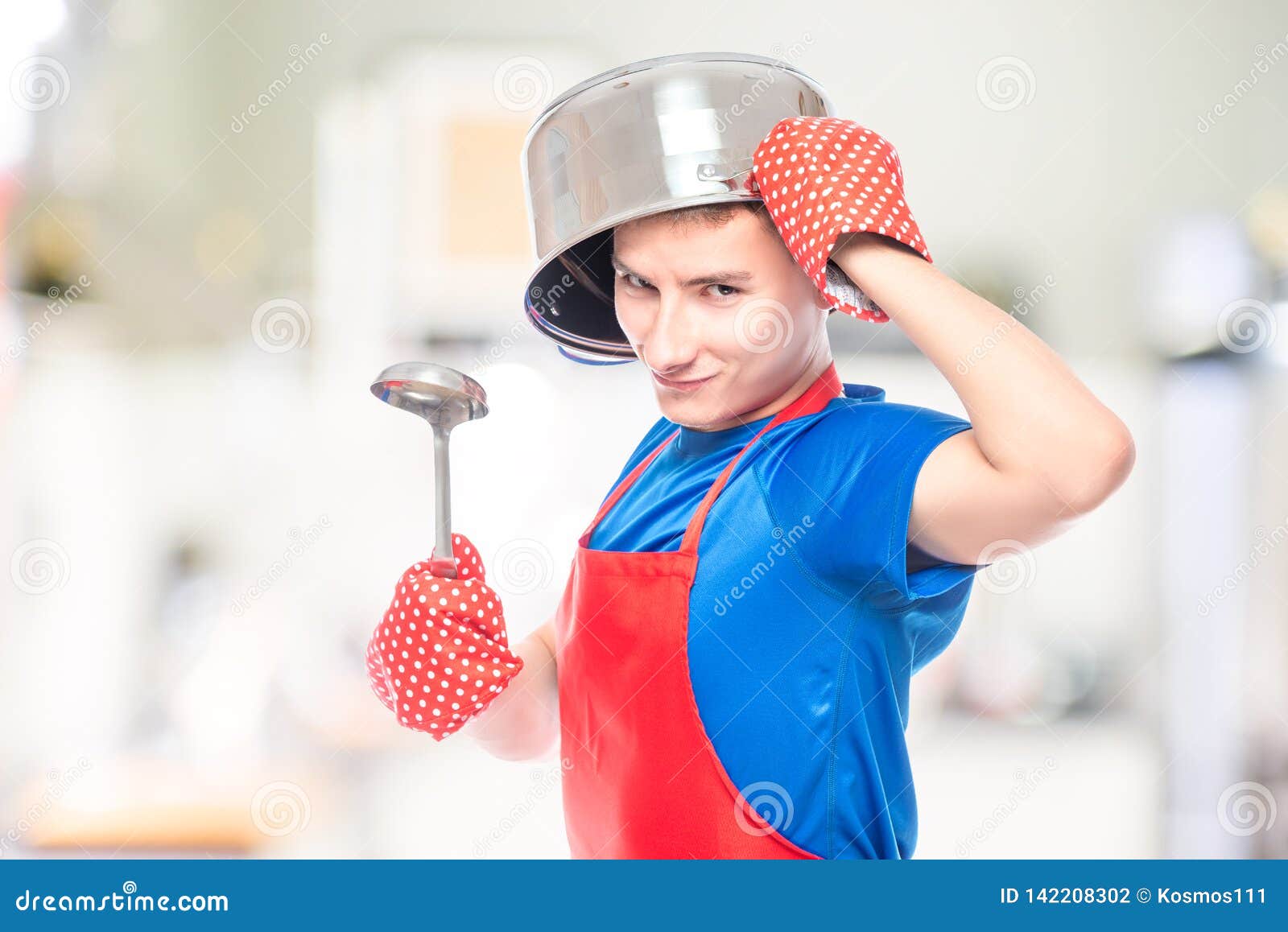 Crazy Man in an Apron with a Pan on His Head Posing Stock Photo - Image ...