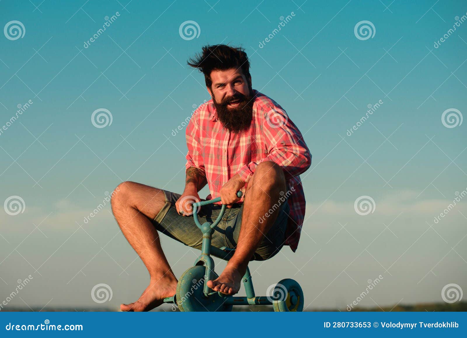 Crazy Man Bicyclist Riding Three Wheeled Bicycle. Stock Image - Image ...
