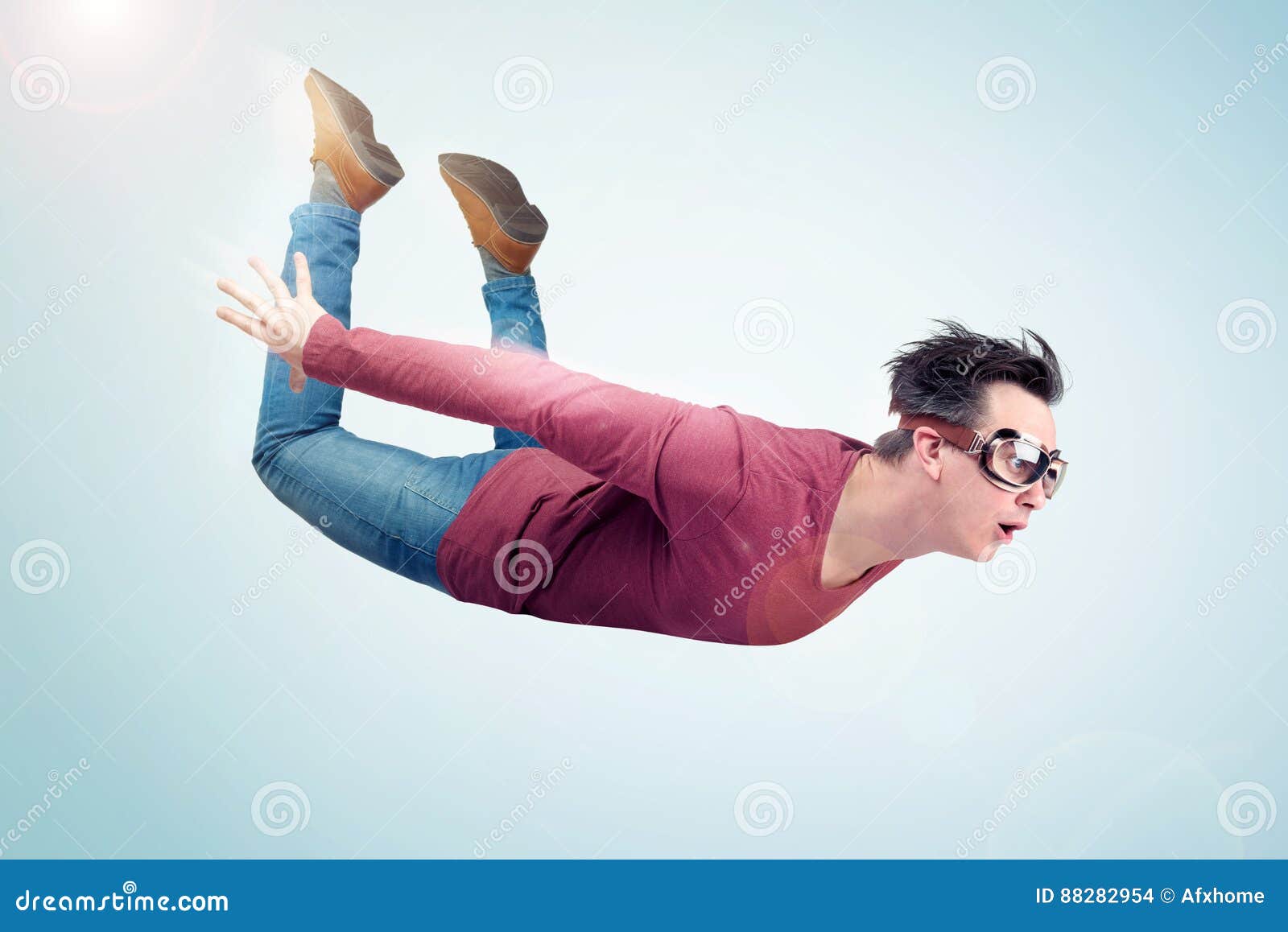 Crazy Man in Goggles is Flying in the Sky. Jumper Concept Stock Photo ...
