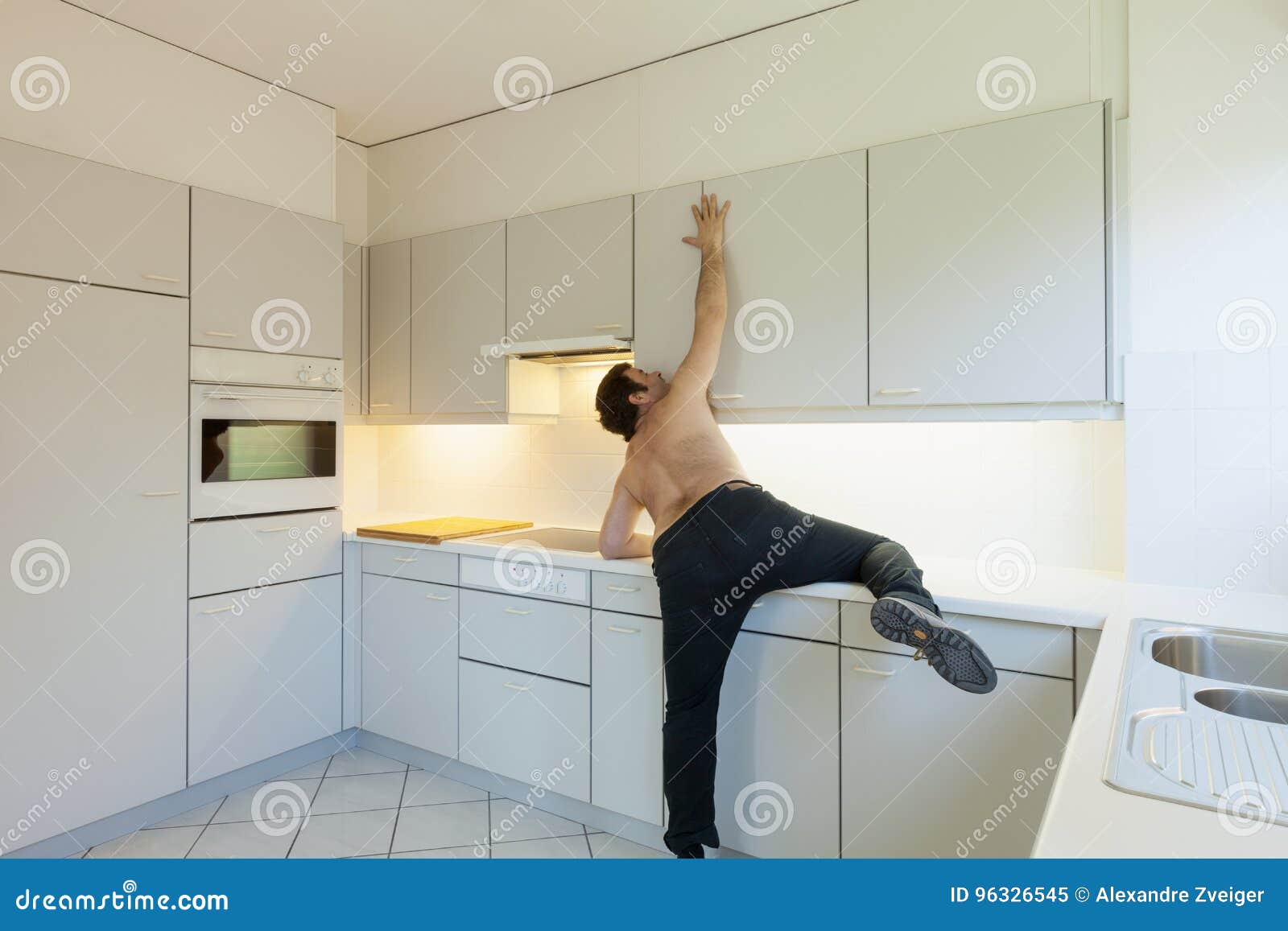 Crazy man in the kitchen stock image. Image of design - 96326545