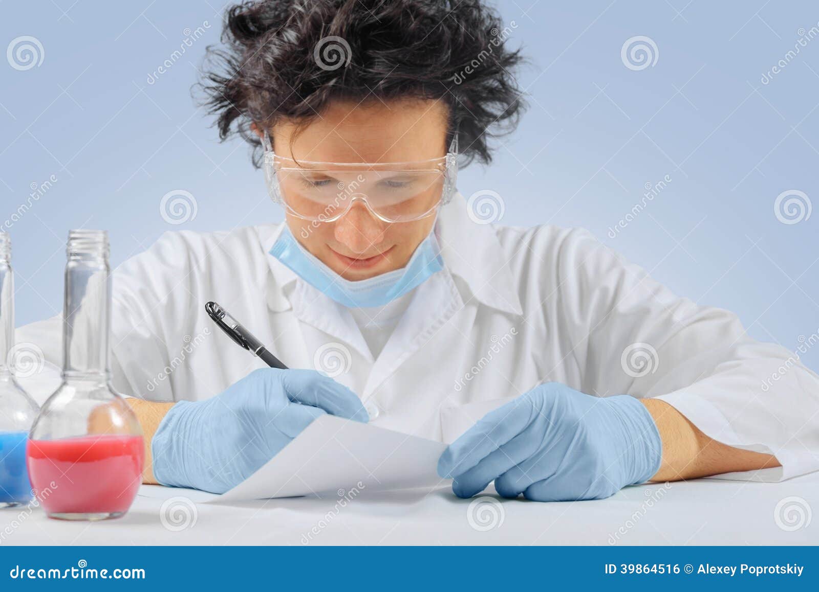 Crazy man scientist writes stock photo. Image of face - 39864516