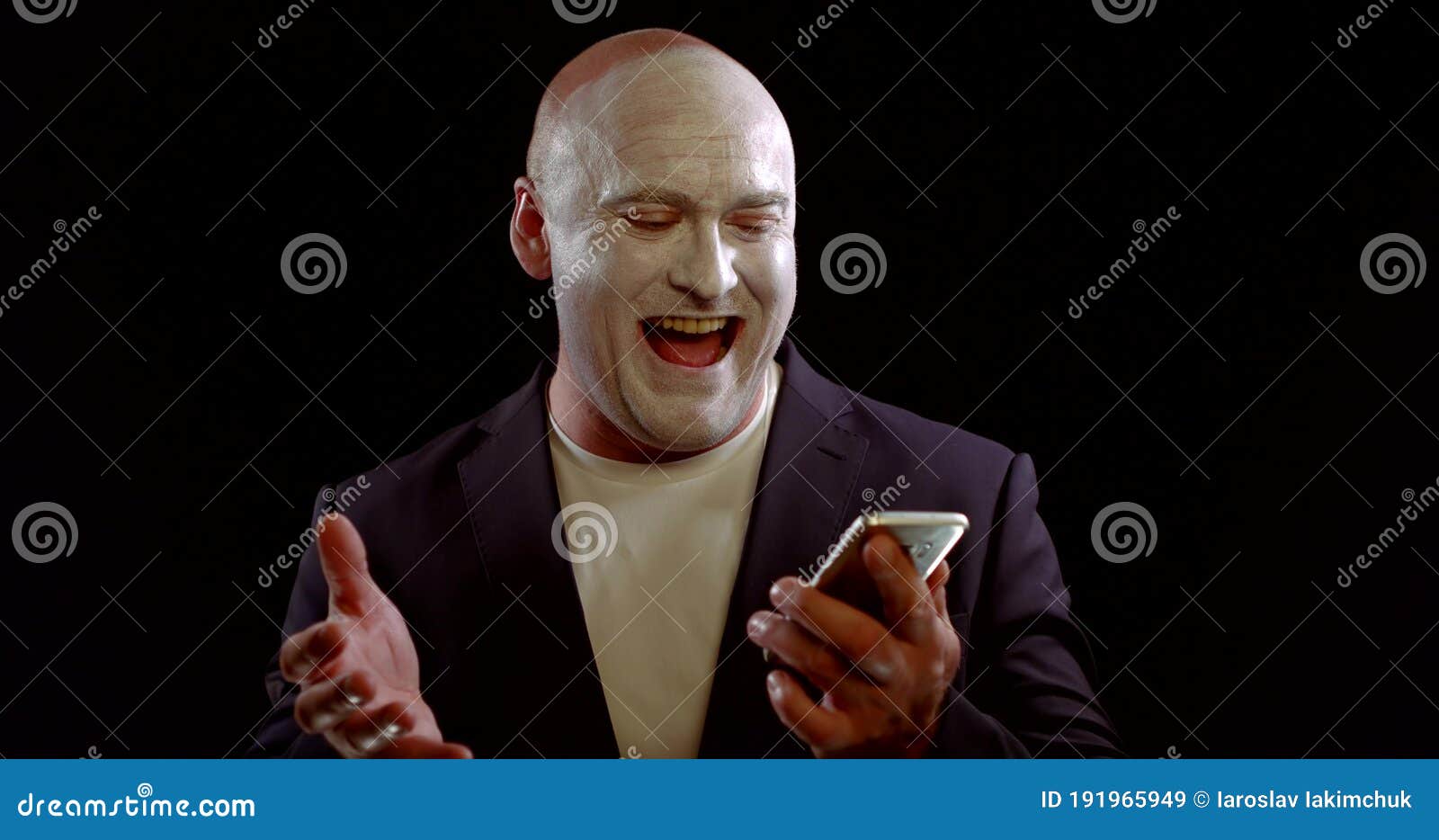 Crazy Man with White Greasepaint on Face is Laughing and Typing on ...