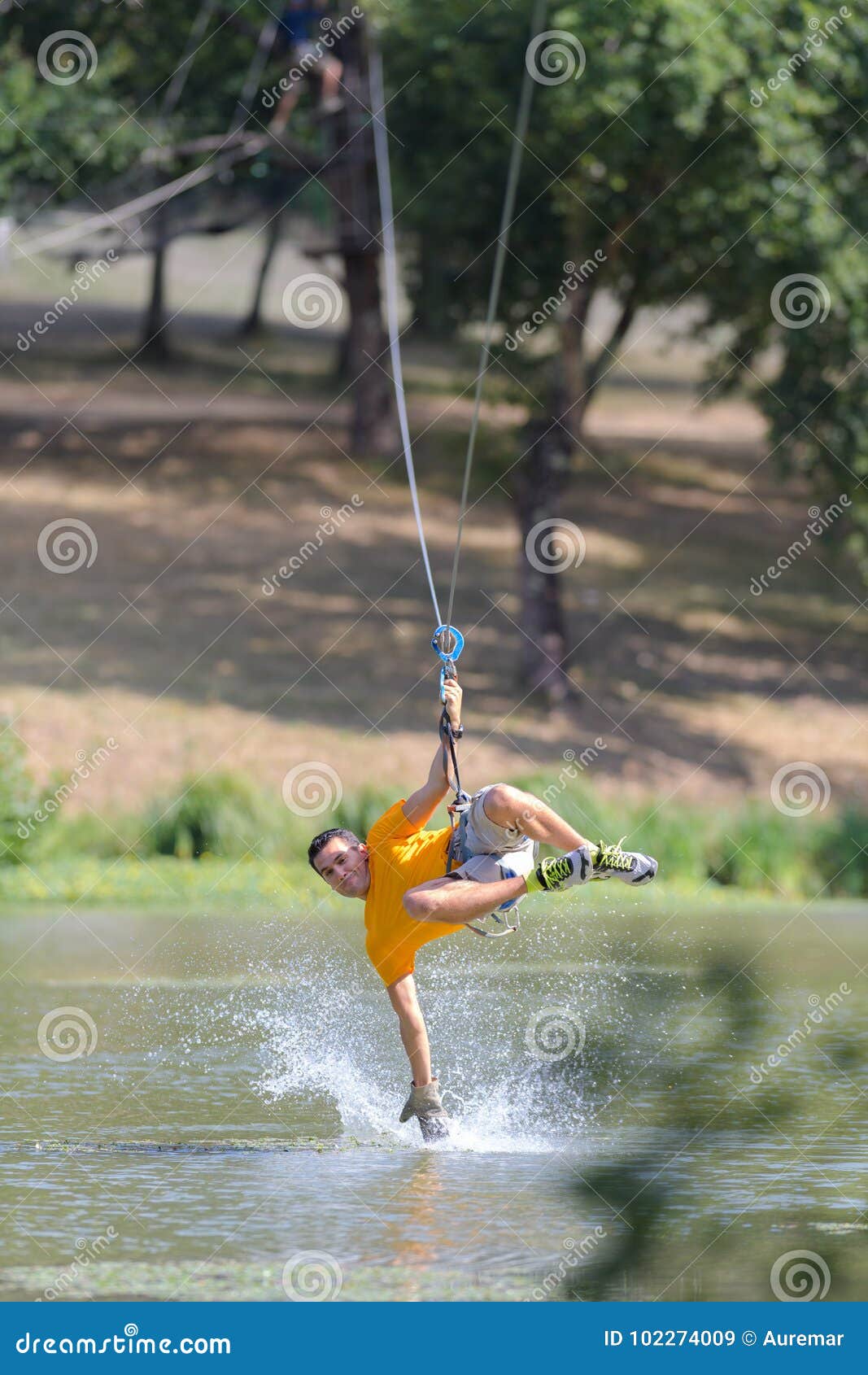 Crazy Man on Zip Line on Water Stock Image - Image of risk, casual ...