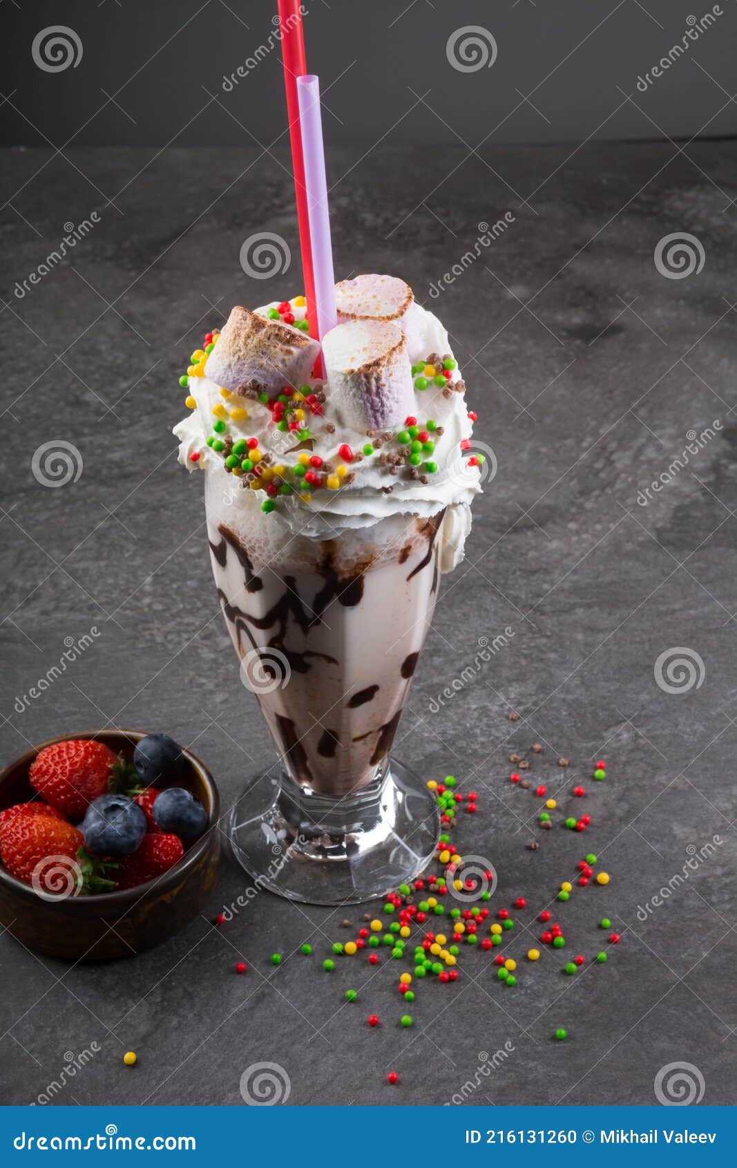 Crazy Milk Shake Decorated with Marshmallows on a Table Stock Photo ...