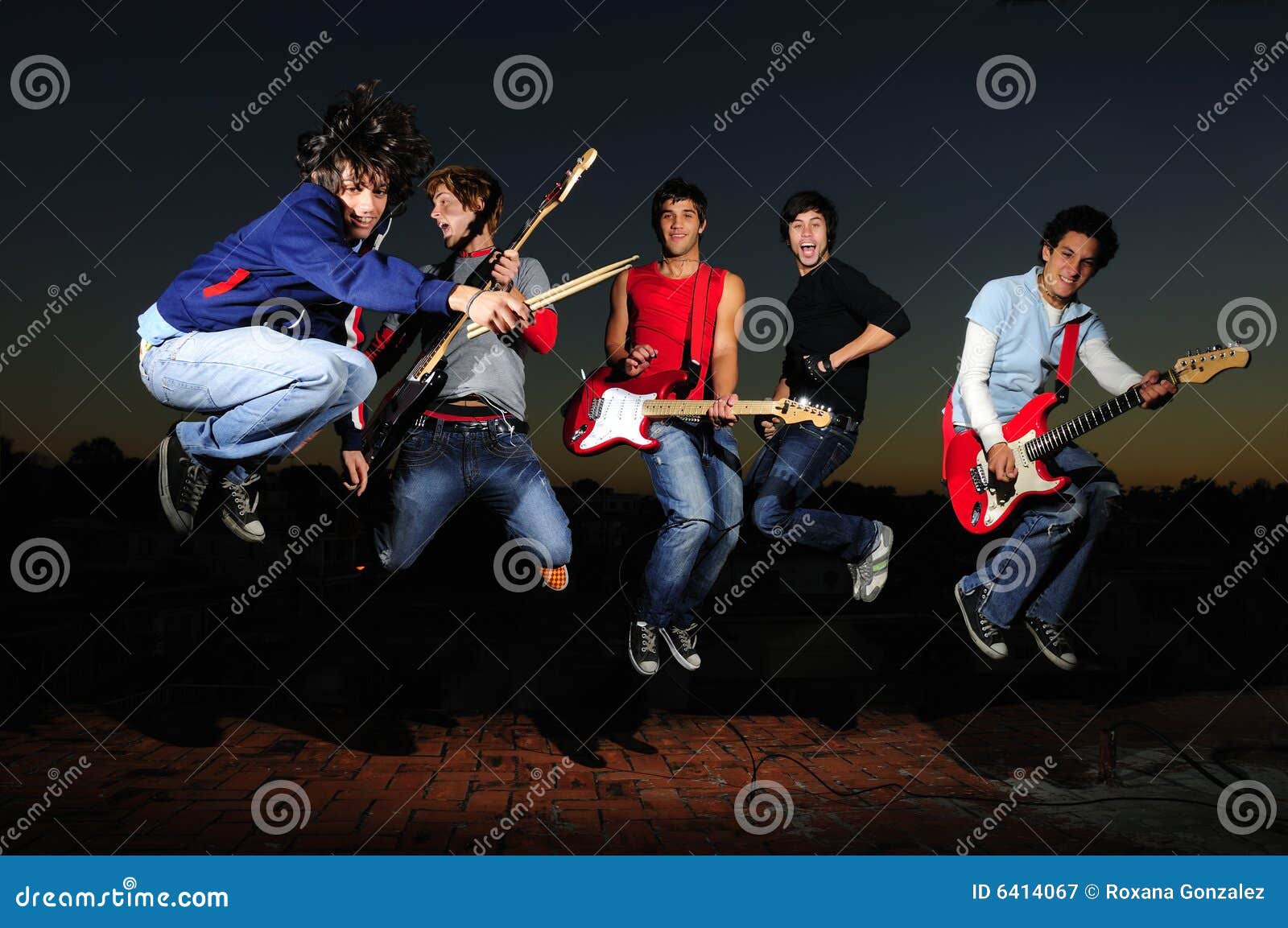 Crazy musical band stock image. Image of jumping, guitar - 6414067