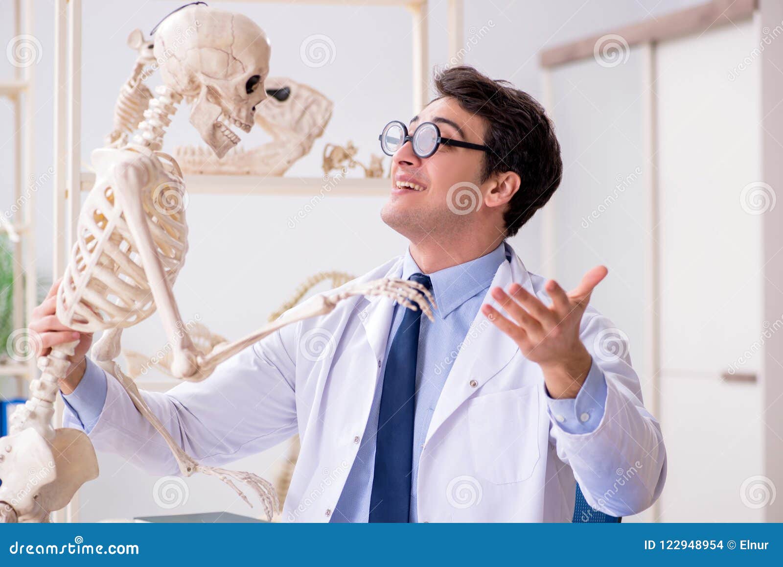 The Crazy Professor Studying Human Skeleton Stock Photo - Image of ...