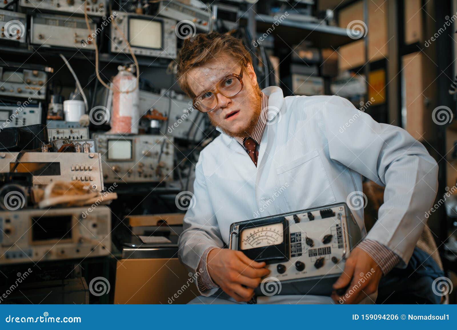 Crazy Scientist Holds Electrical Device in Lab Stock Photo - Image of ...