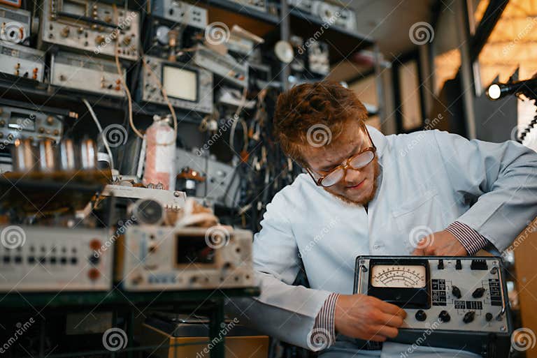 Crazy Scientist Holds Electrical Device in Lab Stock Image - Image of ...