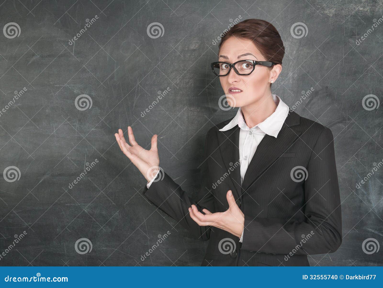 Crazy Teacher In The Classroom On Blackboard Background. Senior Teacher ...