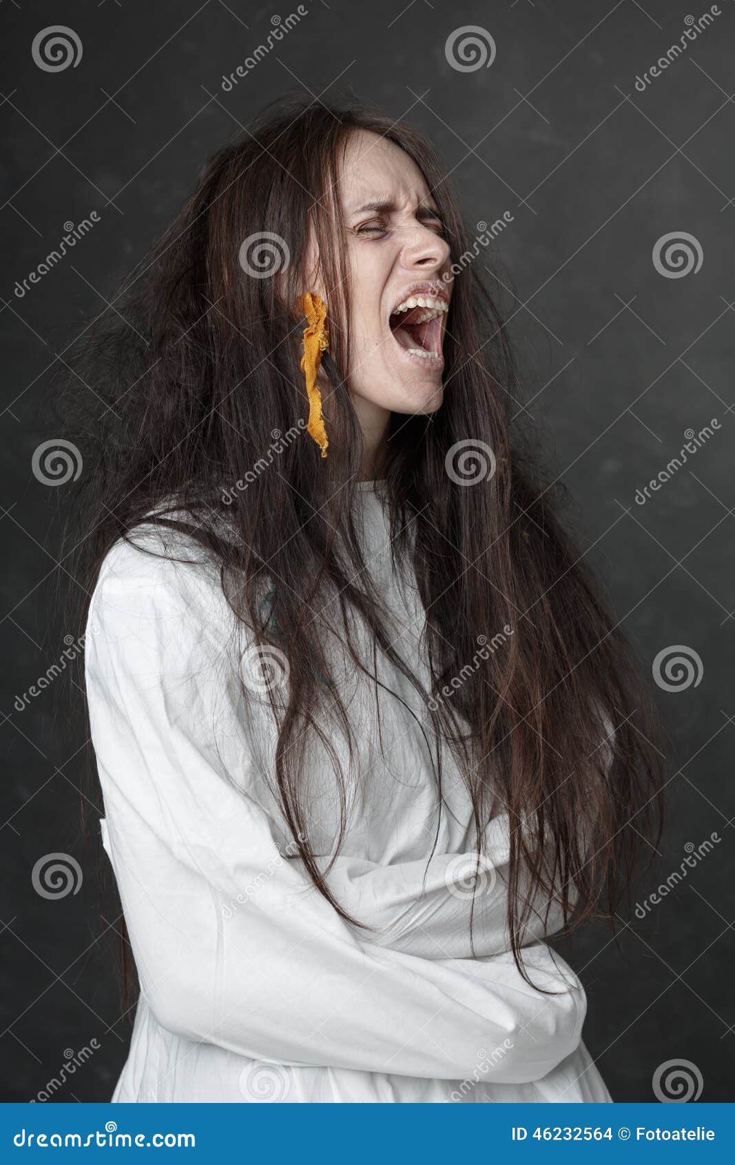 Crazy Woman Screaming In A Straitjacket. Stock Photography ...