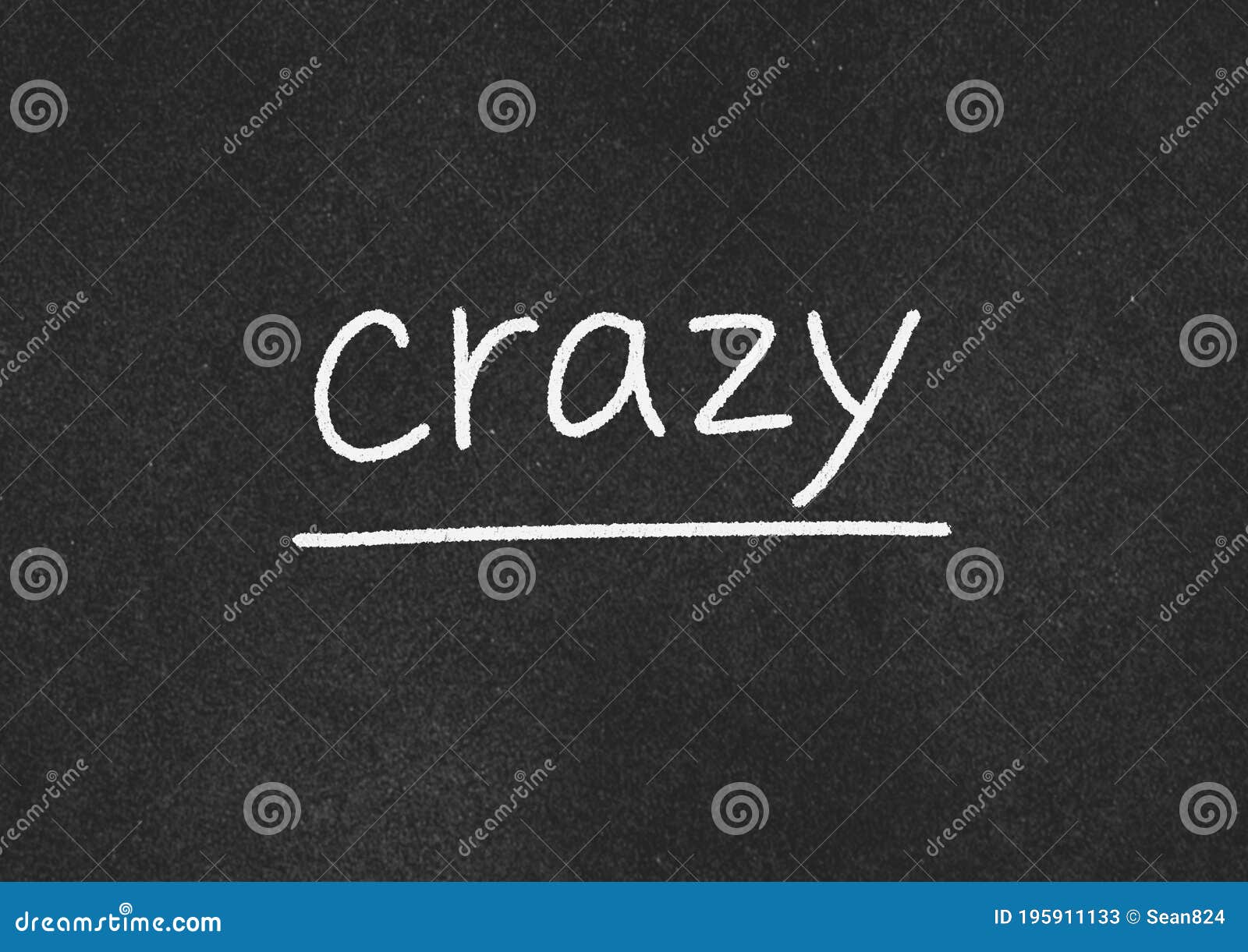 Crazy Word Composed With Multi Colored Stone Letters Over Green Sand ...