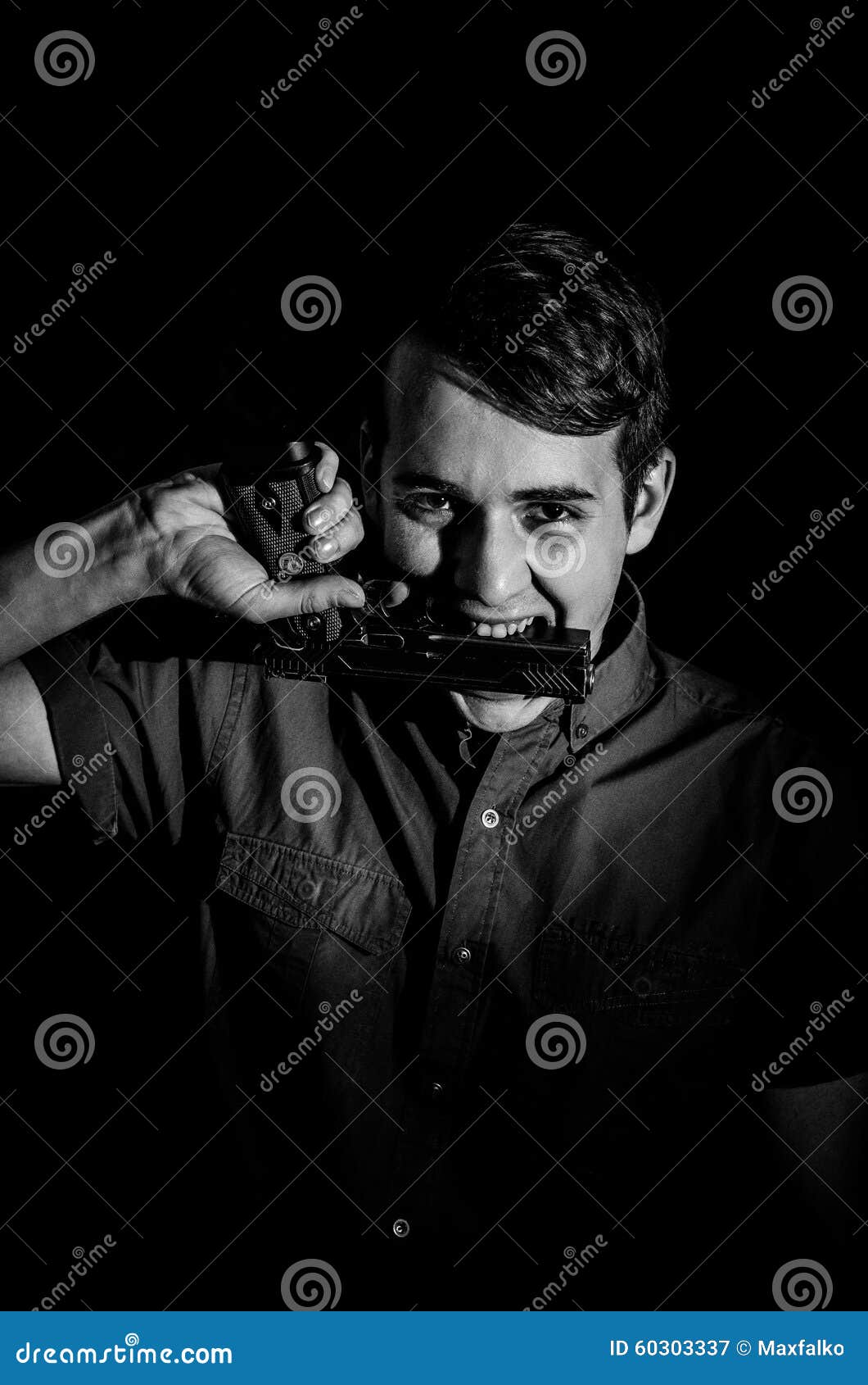 Crazy young man with a gun stock image. Image of elegant - 60303337