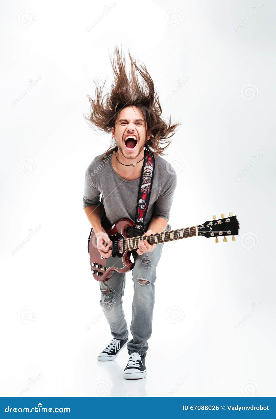 Crazy Young Man Shaking Head and Playing Electric Guitar Stock Photo ...