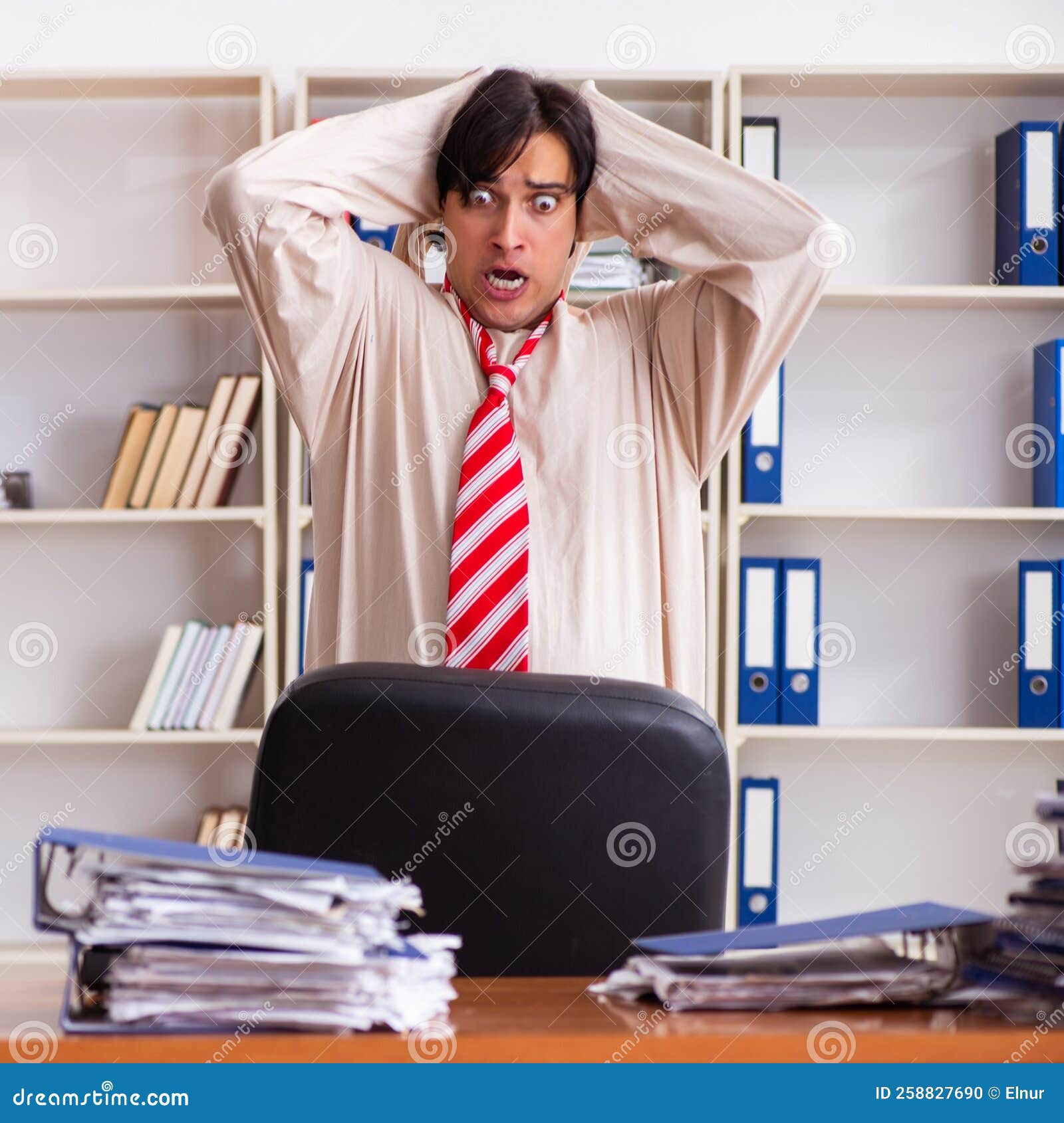 Crazy Young Man in Straitjacket at the Office Stock Photo - Image of ...