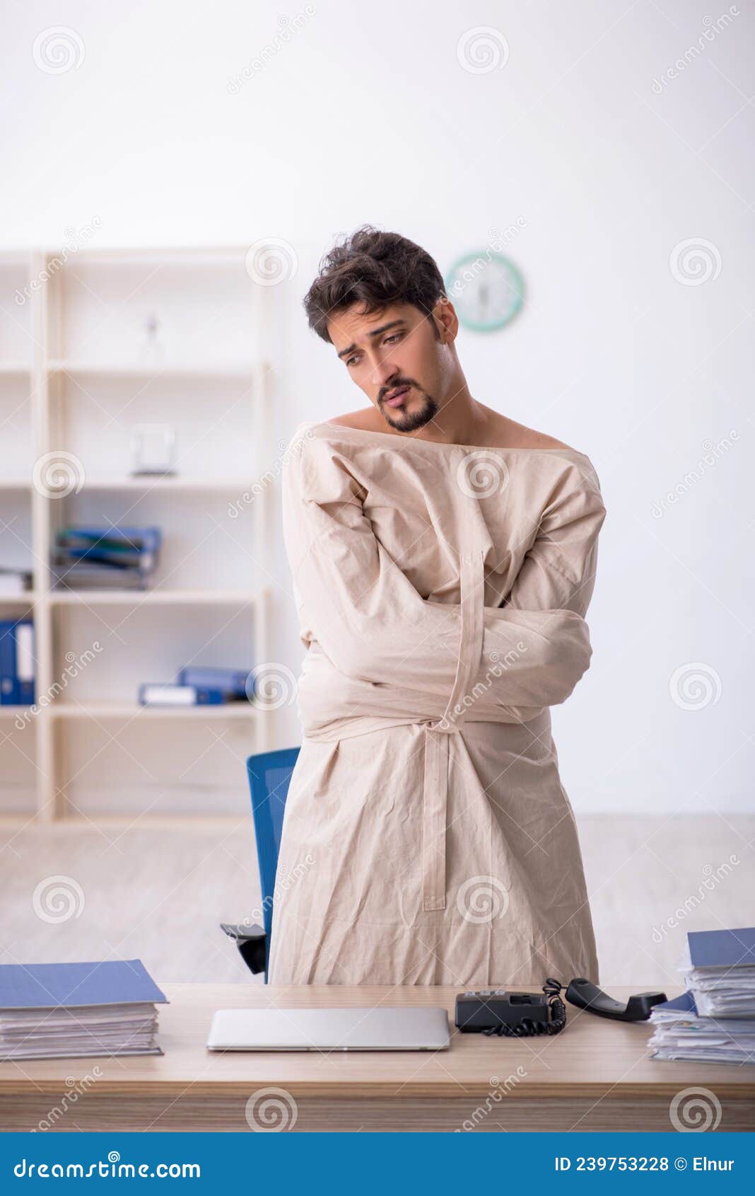 Crazy Young Man in Straitjacket at the Office Stock Photo - Image of ...