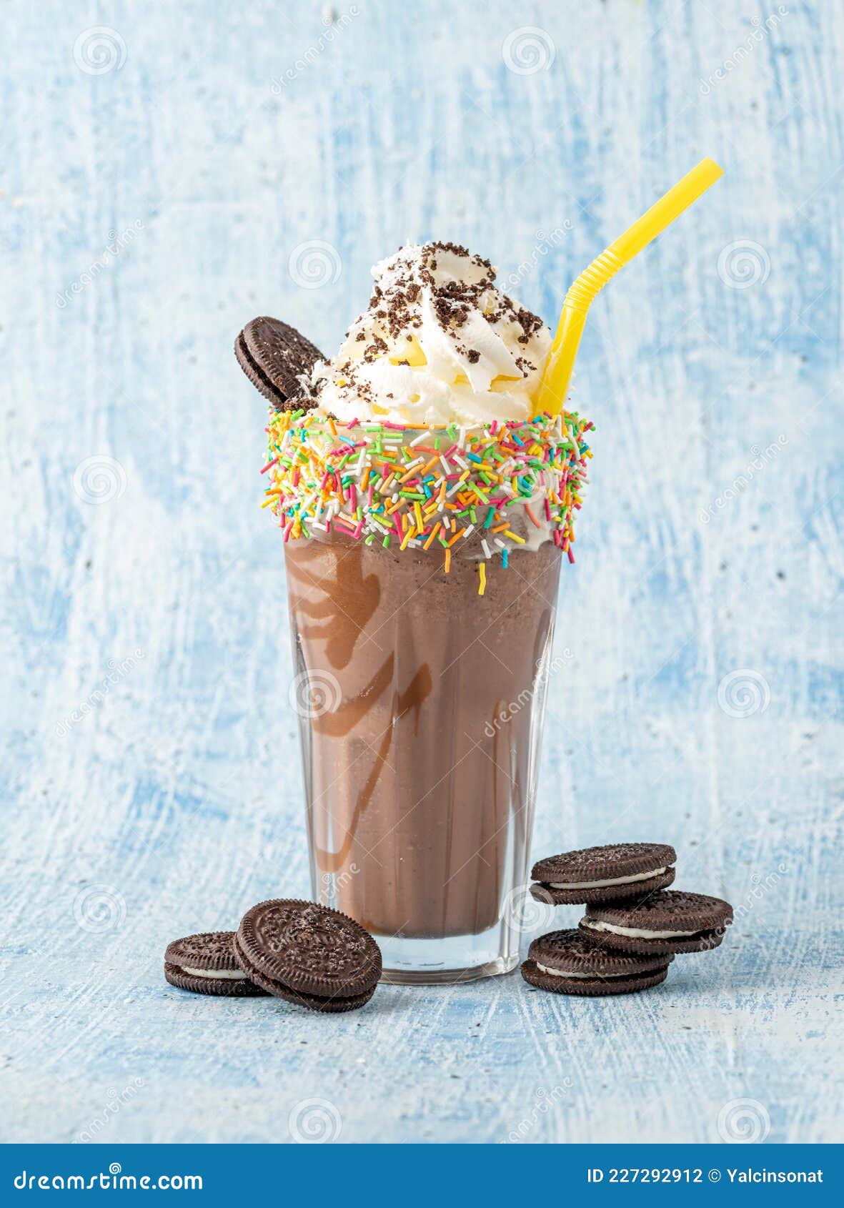Cream and Chocolate Milkshake on Blue Background Stock Photo - Image of ...