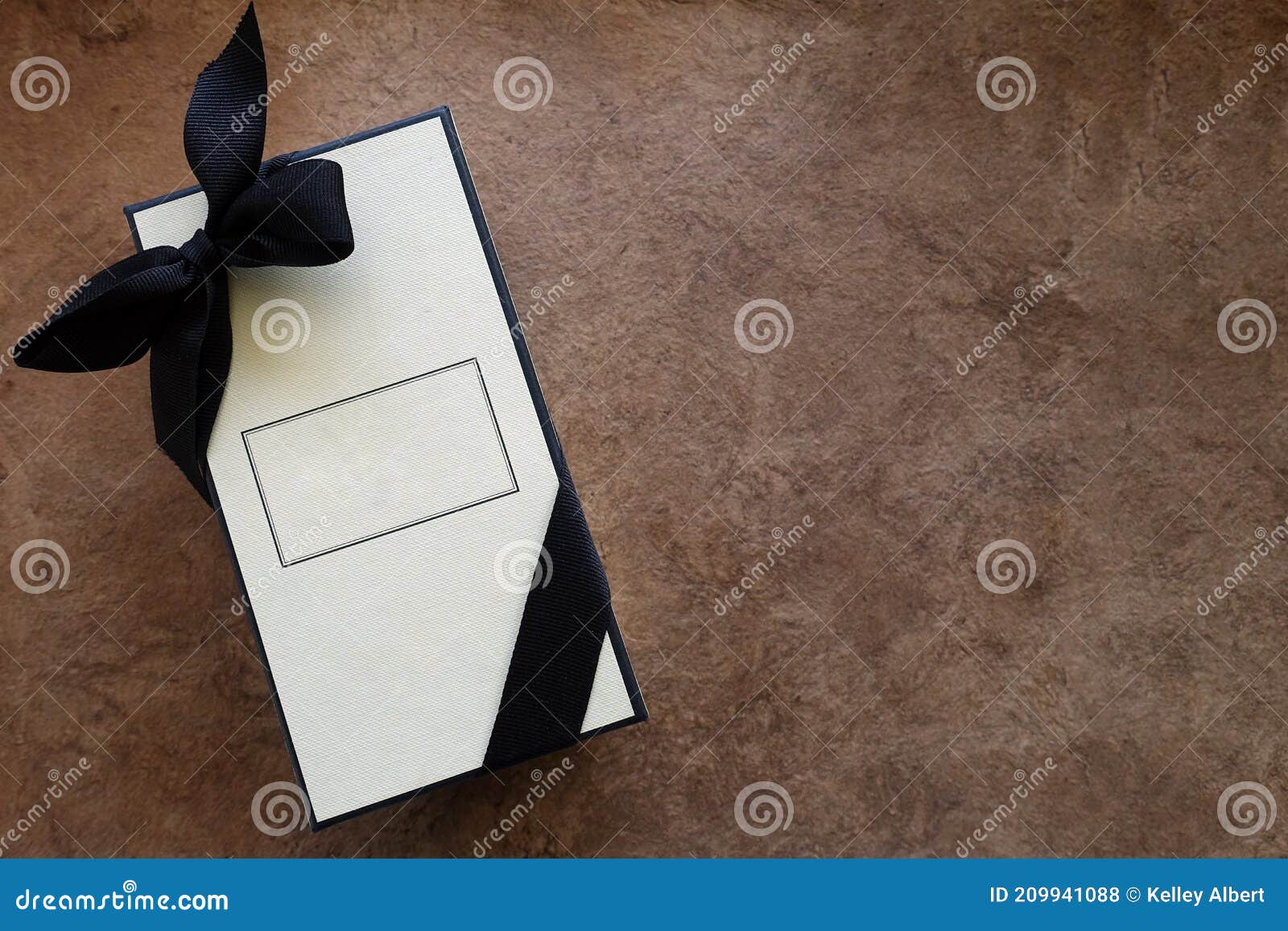 Cream Colored Rectangular Box with Black Ribbon Stock Photo - Image of ...