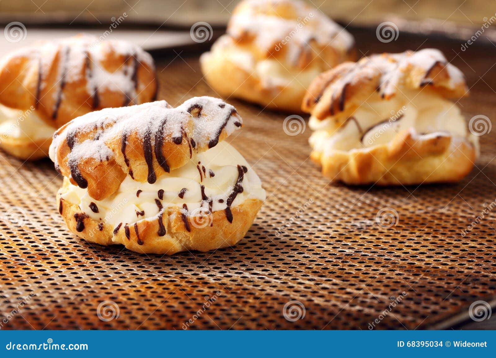 Cream Puff Cake with Filling and Chocolate Icing Stock Photo - Image of ...