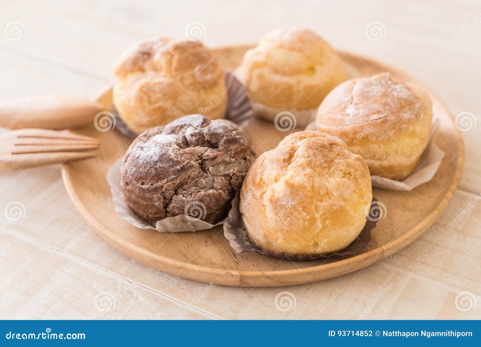 Cream puff on plate stock photo. Image of puff, delicious - 93714852