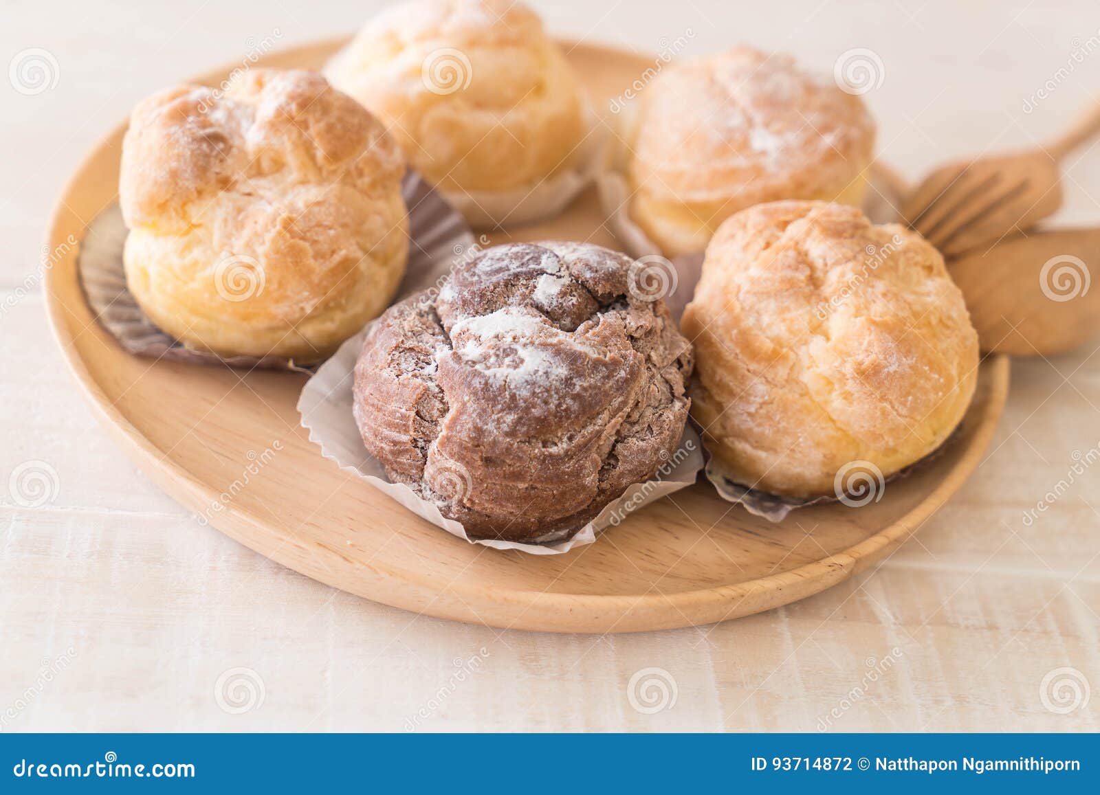Cream puff on plate stock photo. Image of filling, plate - 93714872