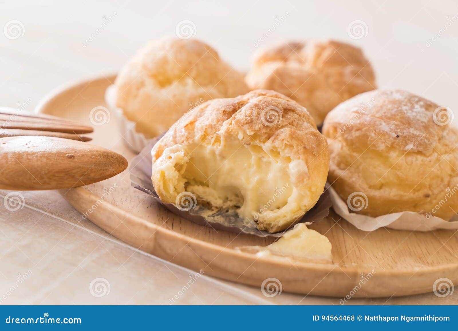 Cream puff on plate stock photo. Image of pastry, cuisine - 94564468
