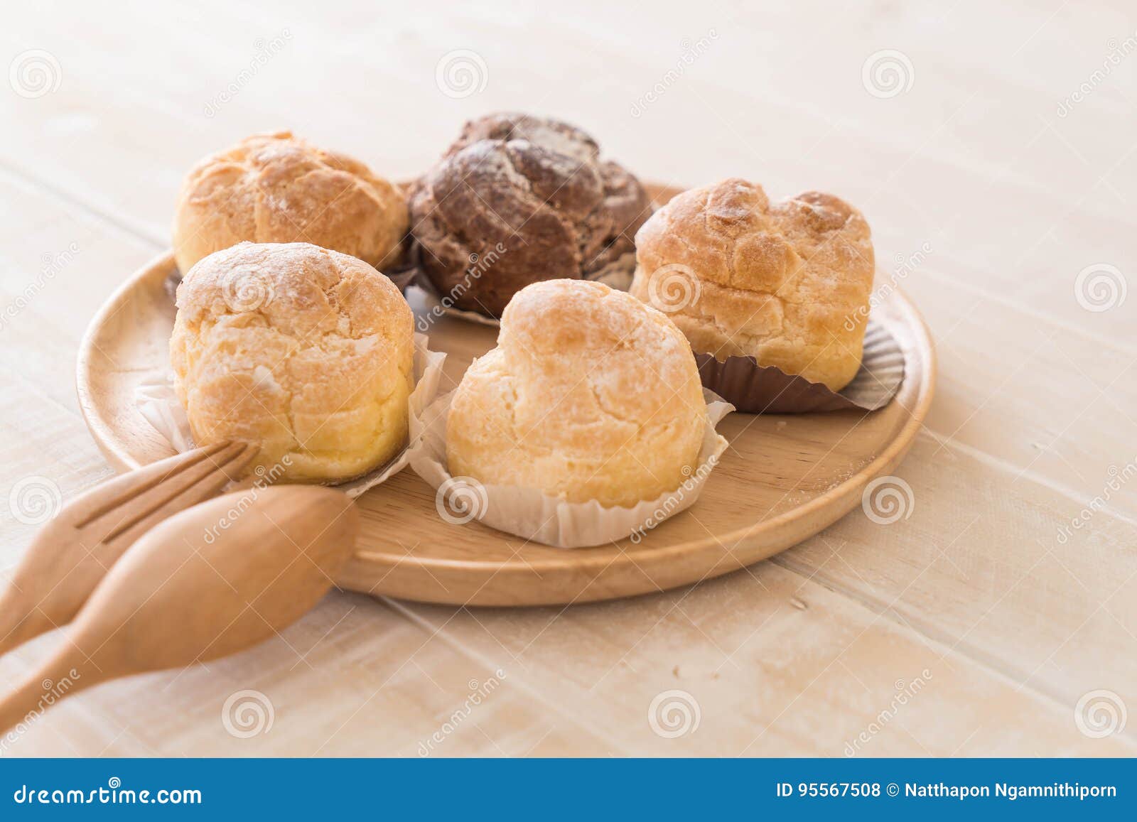 Cream puff on plate stock photo. Image of food, choux - 95567508
