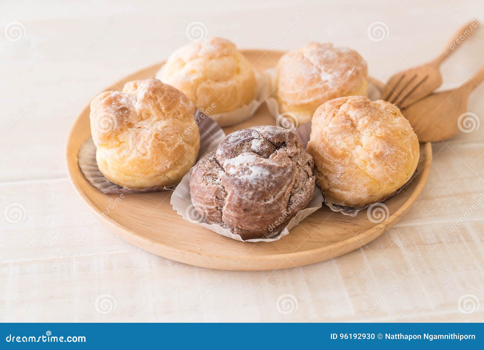 Cream puff on plate stock photo. Image of cake, delicious - 96192930
