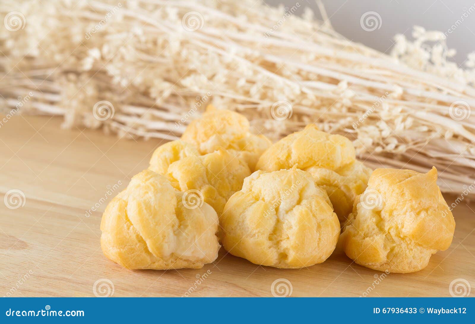 Cream Puff on Wood Table stock image. Image of products - 67936433
