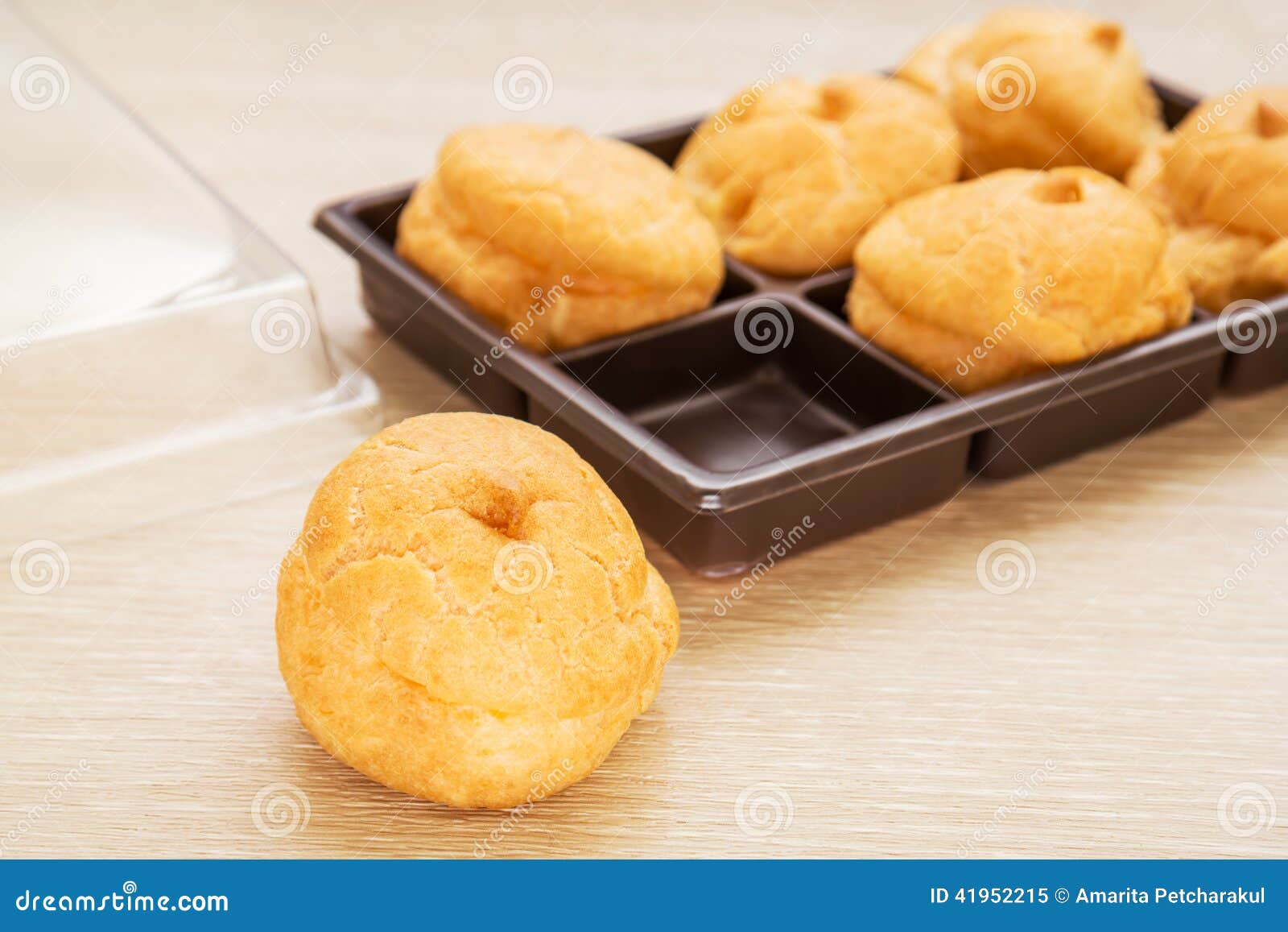 Cream Puffs and Plastic Box Stock Image - Image of pastry, bakery: 41952215