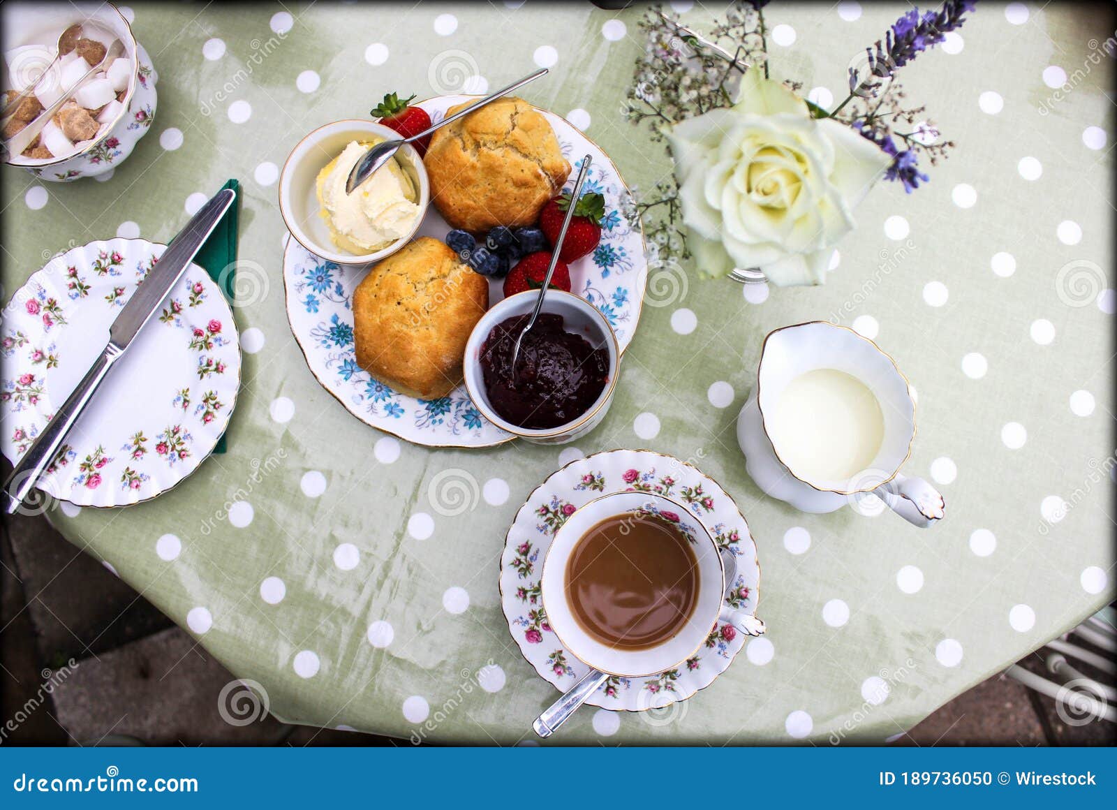 Afternoon Tea. A Set Of Scones And Clotted Cream Served With Hot Tea ...